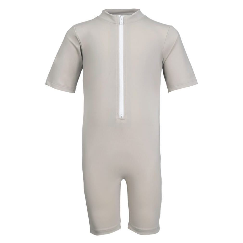 Noe BASIC UV-sunsuit S/S - latte - Petit Crabe