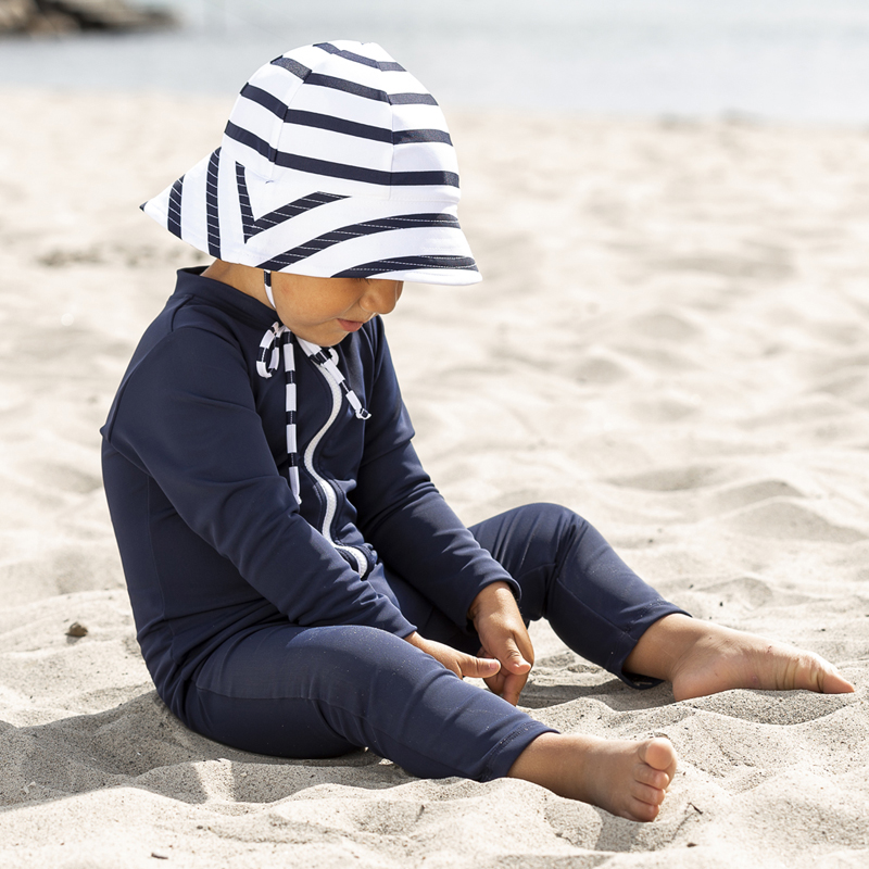 Lou BASIC UV-sunsuit L/S - blue - Petit Crabe