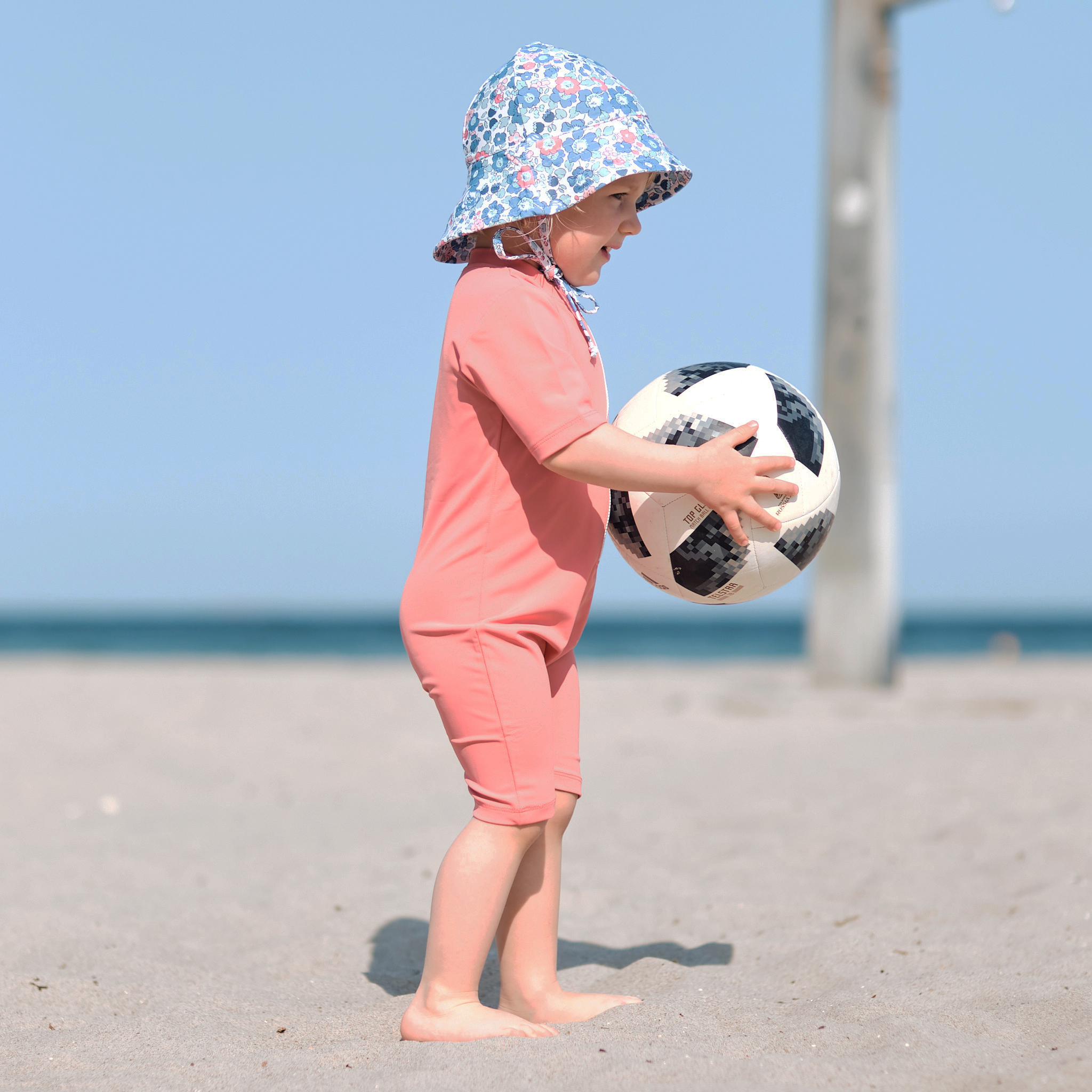 Noe BASIC UV-sunsuit S/S - lemonade - Petit Crabe