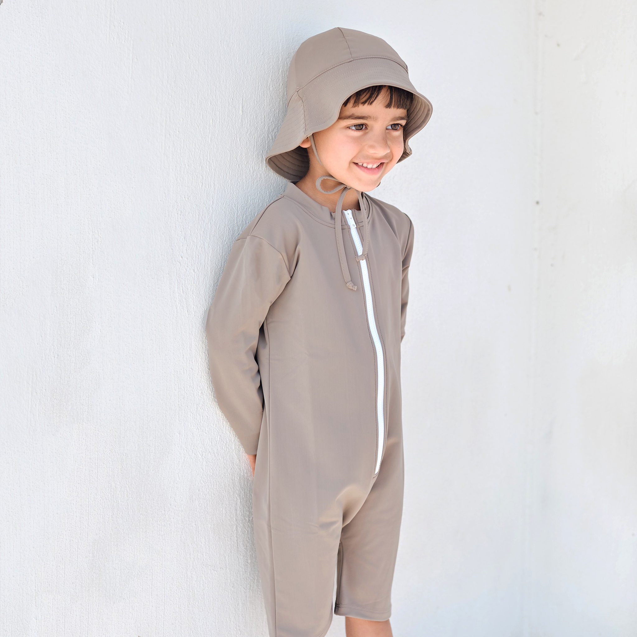 Combi Sunsuit - taupe - Petit Crabe