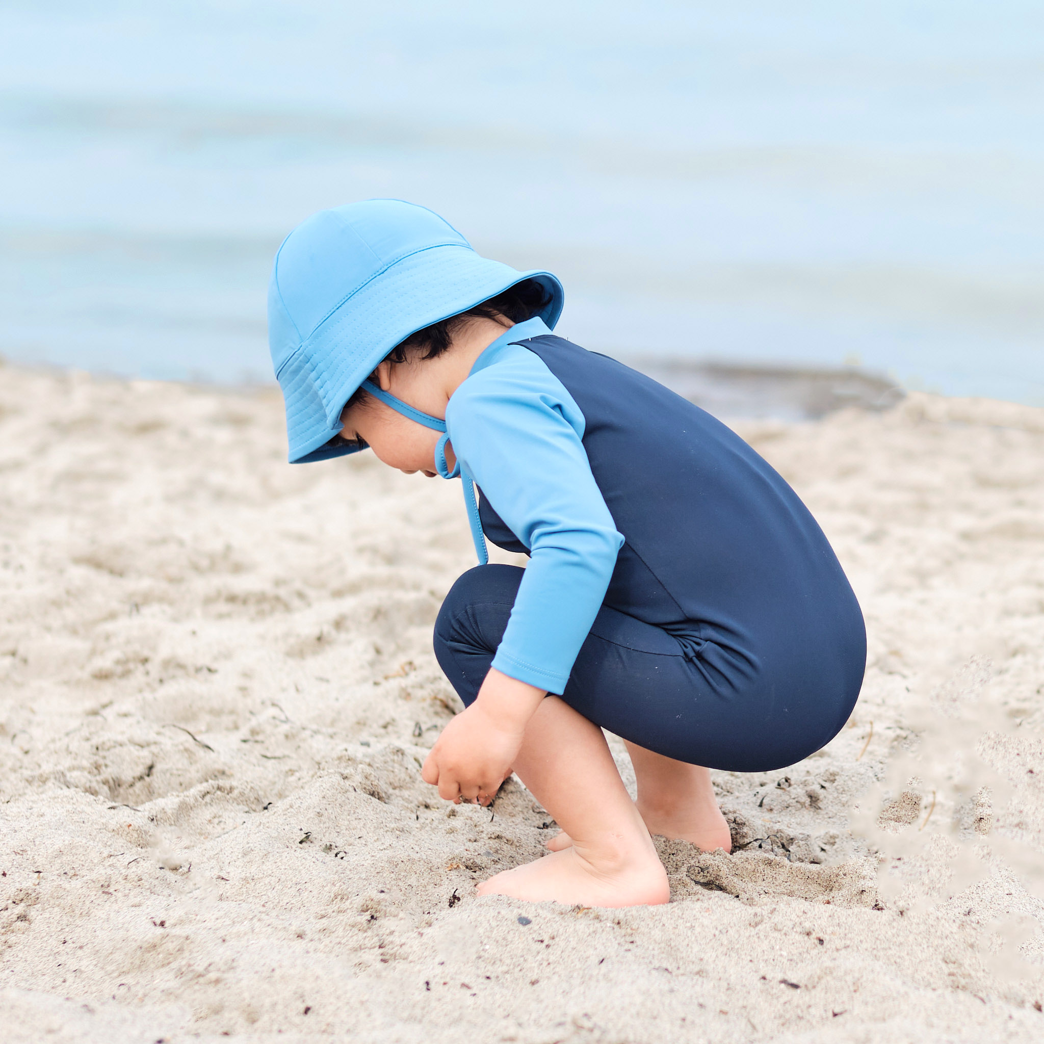 Multi Color UV-Sunsuit L/S - Blue - Petit Crabe