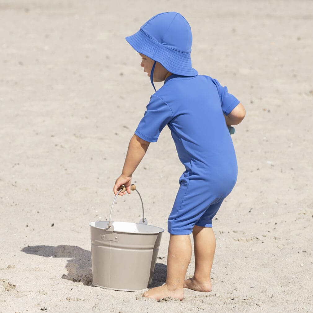 Noe BASIC UV-sunsuit S/S – sapphire - Petit Crabe