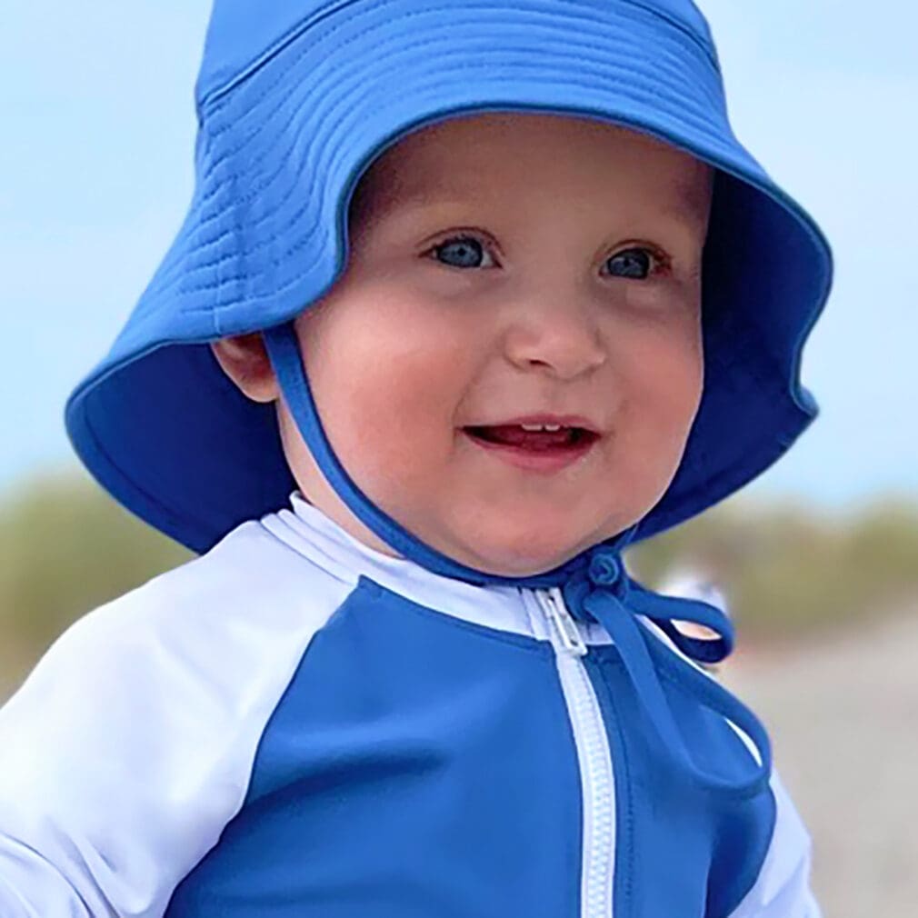 Multi Color Sunsuit S/S – sapphire - Petit Crabe